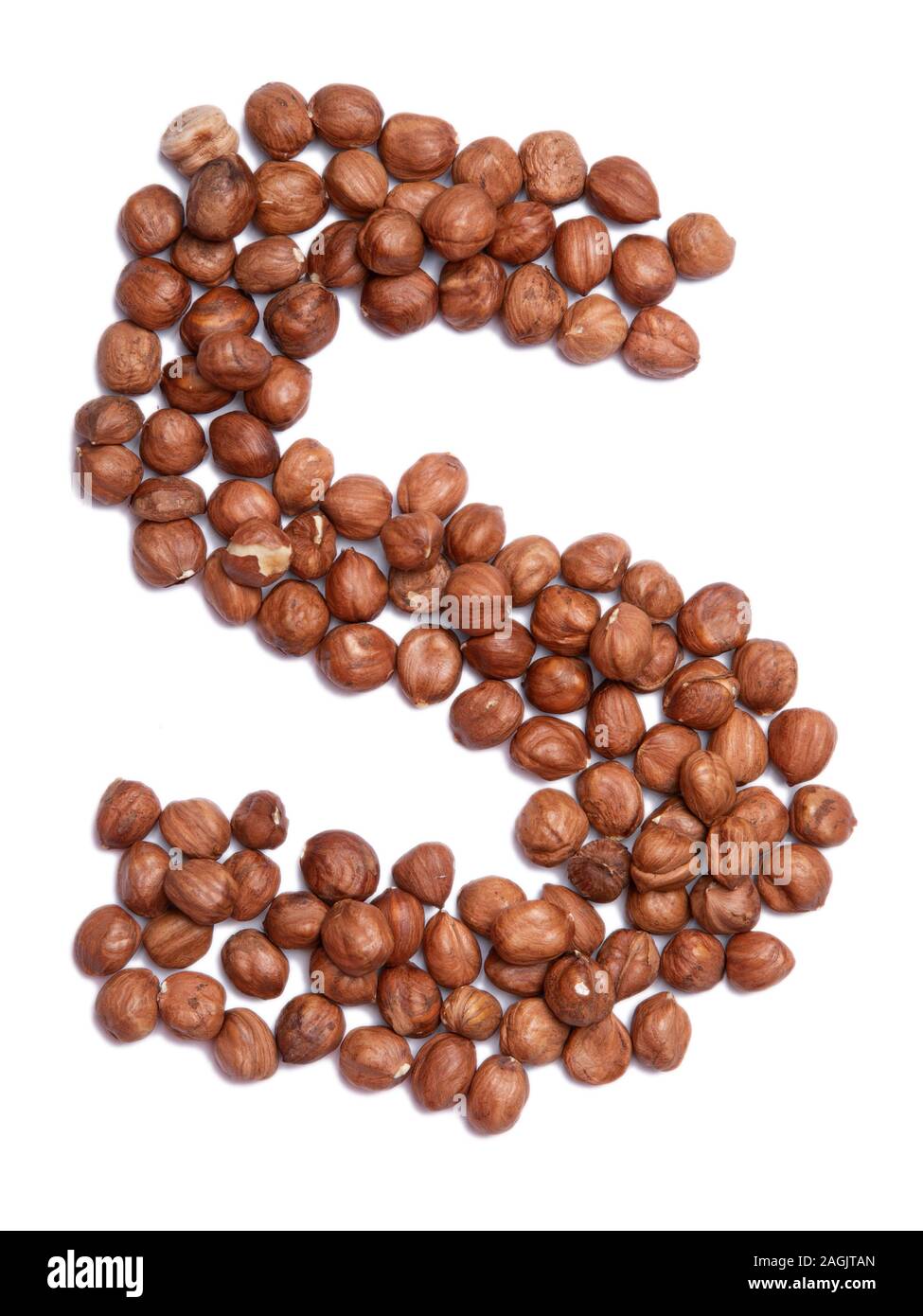 Letter S of the English alphabet from from hazelnut on a white isolated ...