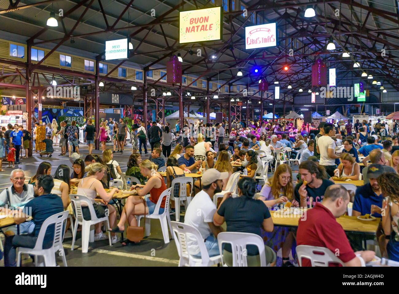 People enjoying food and drink in Queen Victoria Night Market for ...