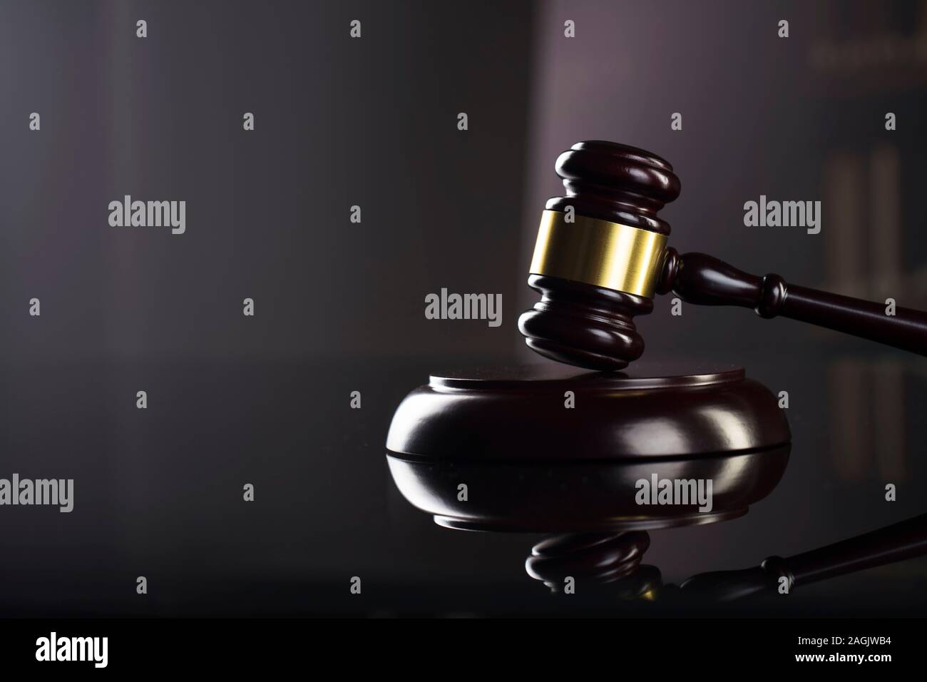 Law and justice theme. Gavel of the judge on court library background ...