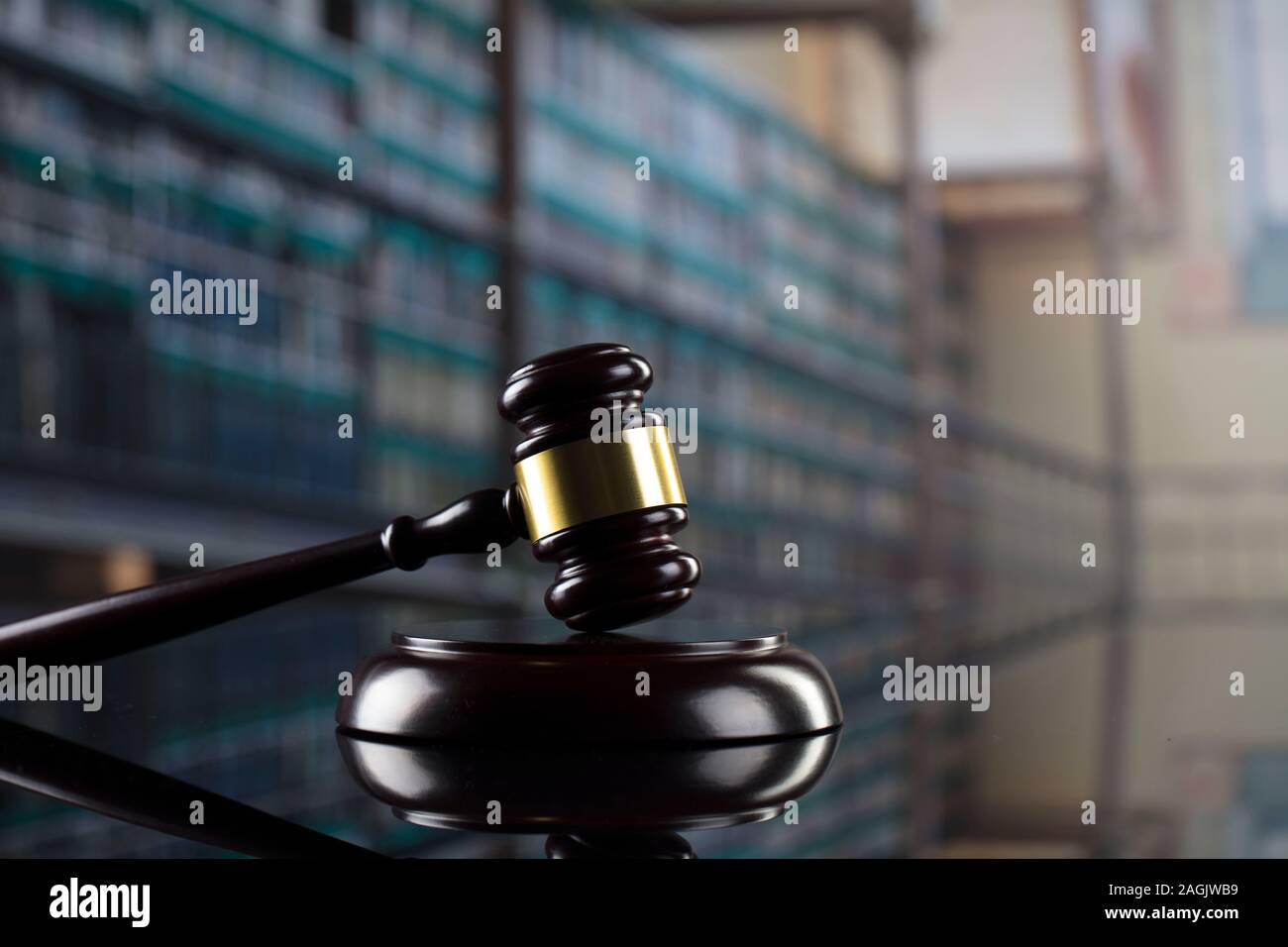 Law and justice theme. Gavel of the judge on court library background ...