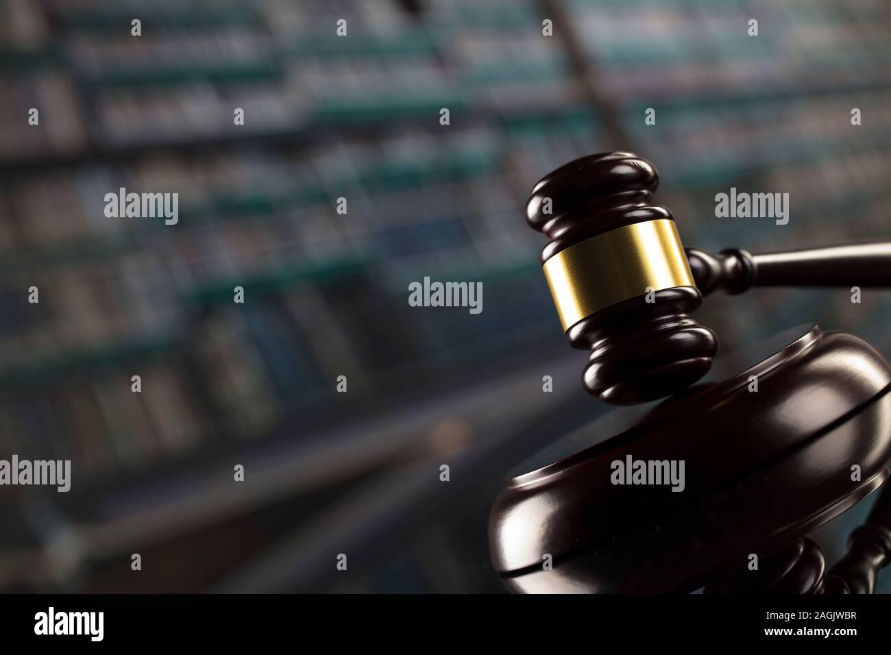 Law and justice theme. Gavel of the judge on court library background ...