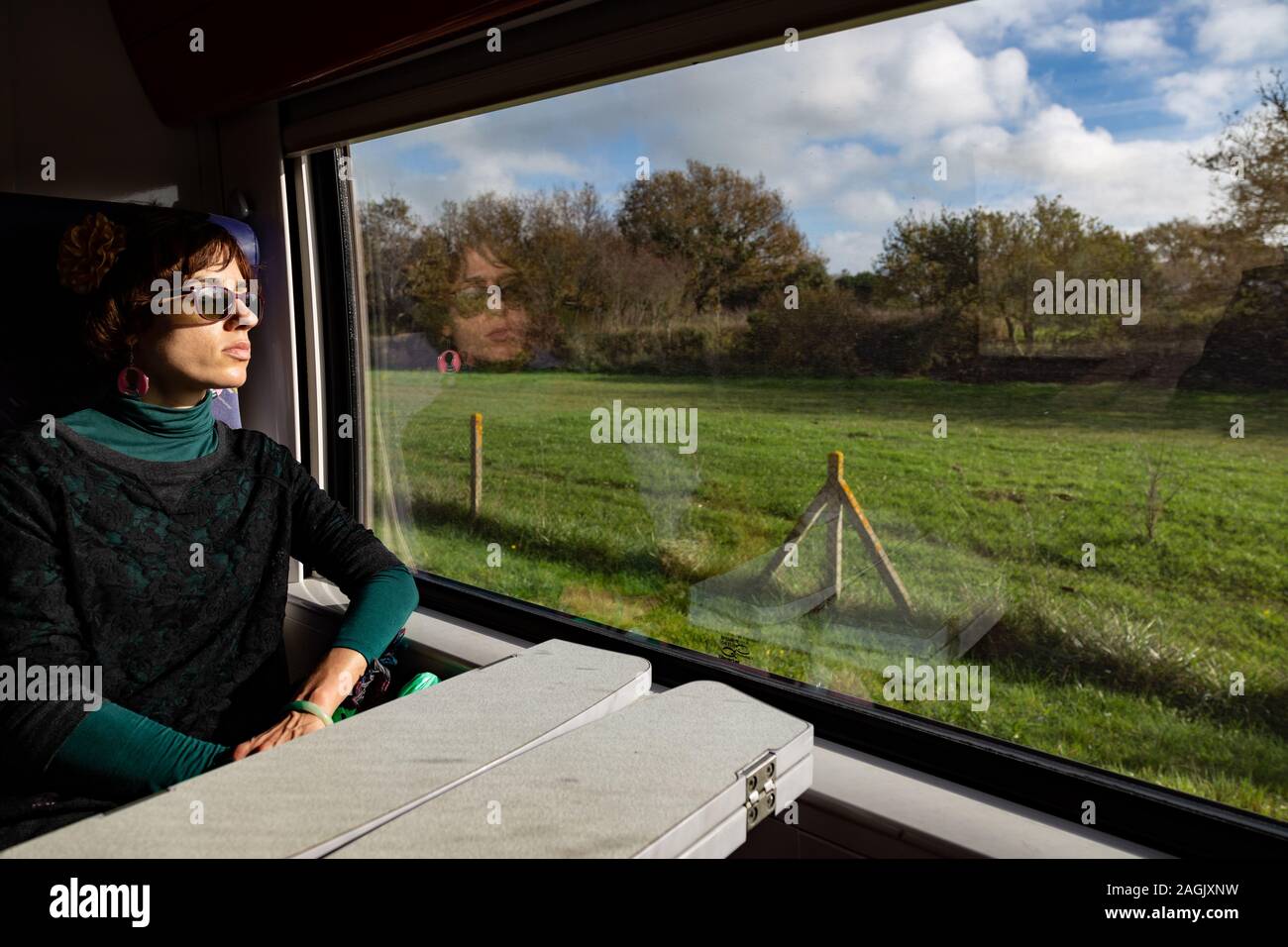 Train window reflection woman hi-res stock photography and images - Alamy