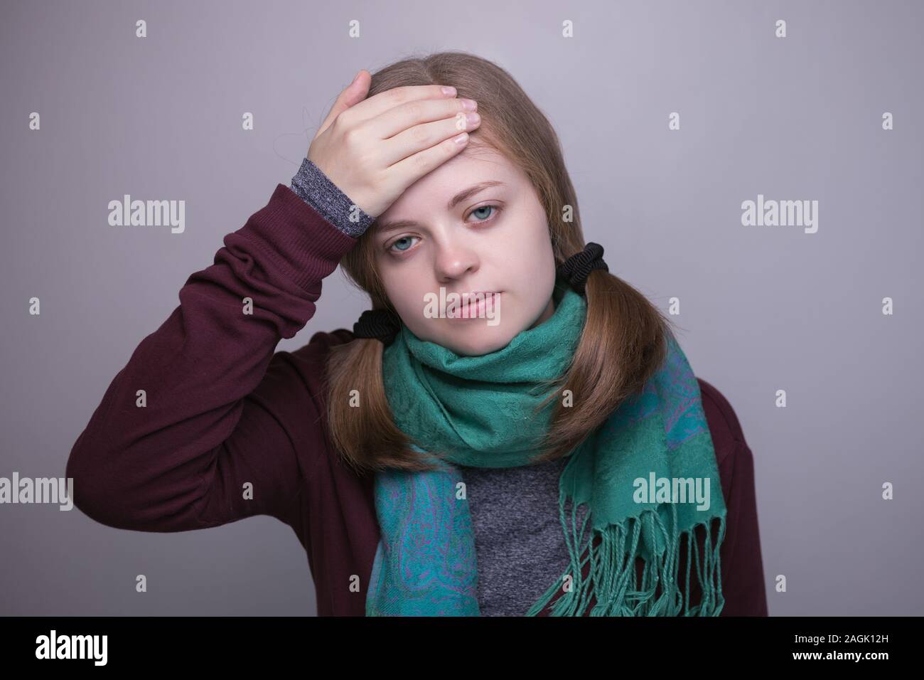Young caucasian girl woman with thermometer looks sick, fever, cold ...