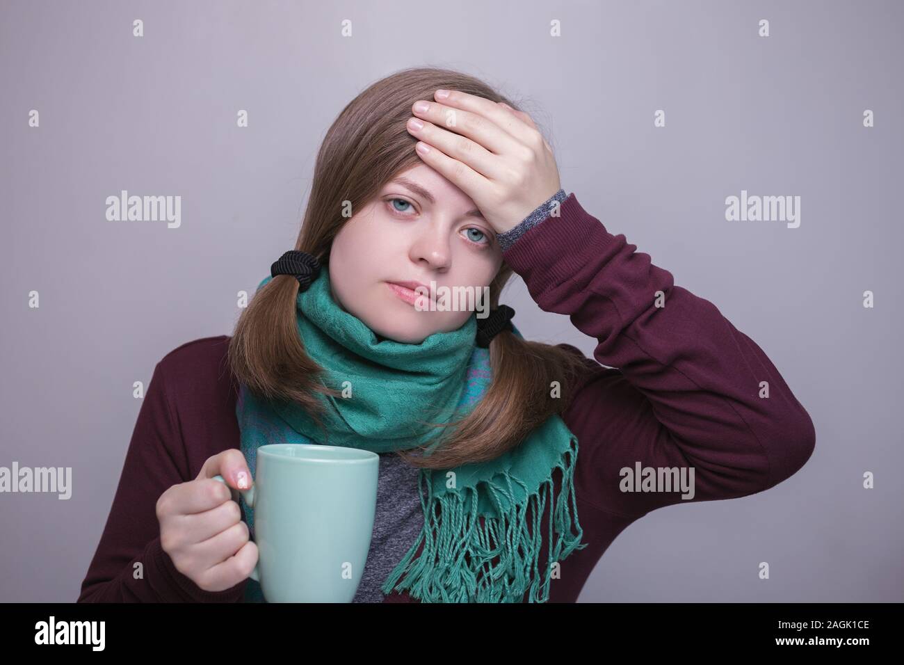 Young caucasian girl woman with thermometer looks sick, fever, cold ...