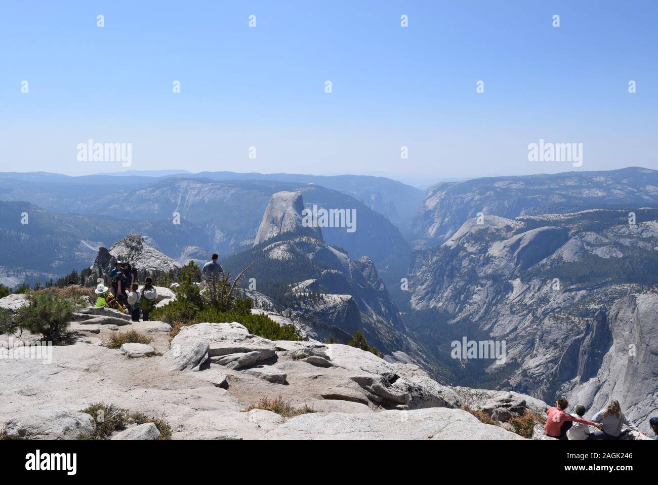Hikers ending their journey at the summit of Clouds' Rest, the terminus ...