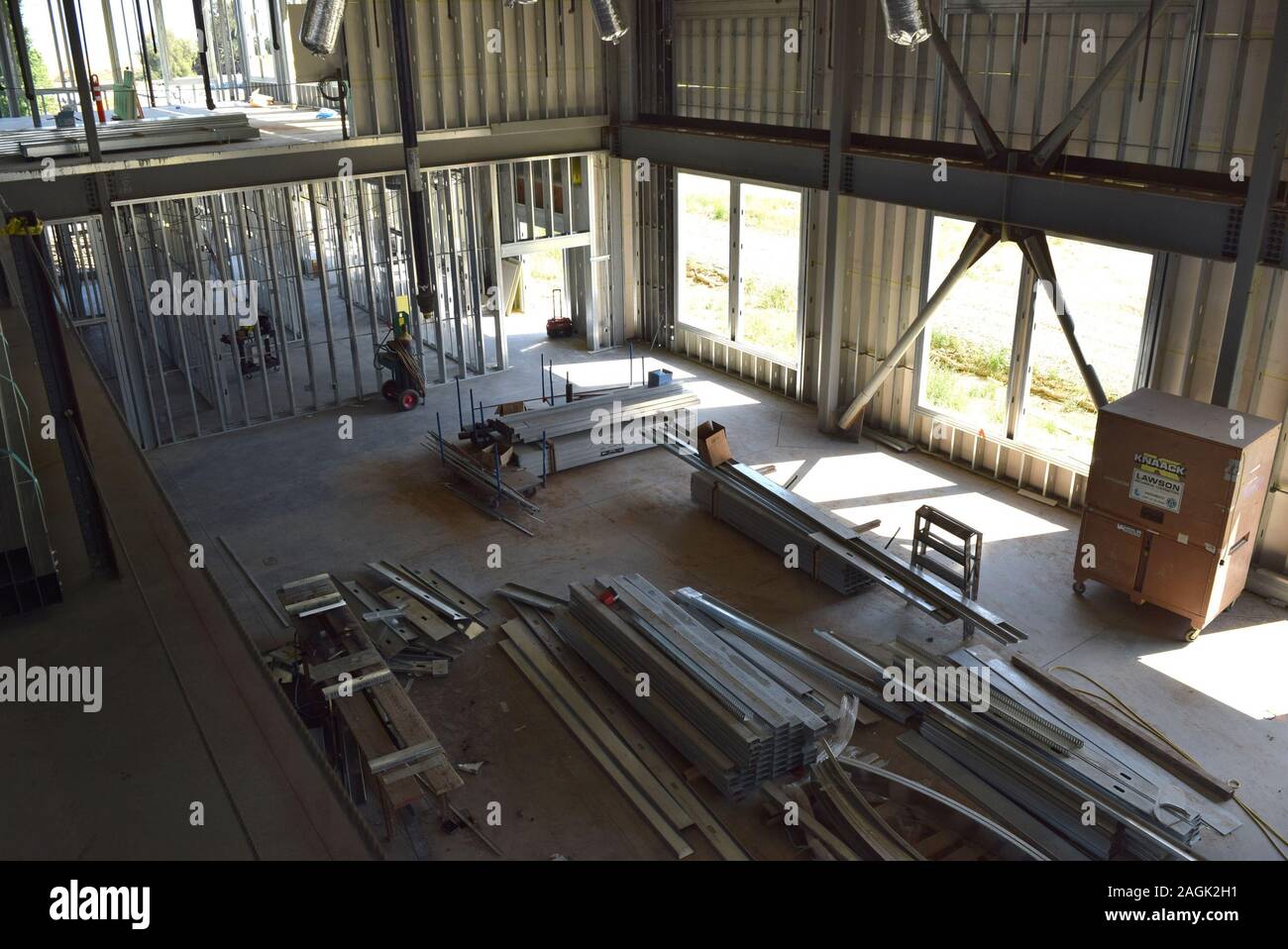 Metal-framed building under construction. Structure has mostly been ...