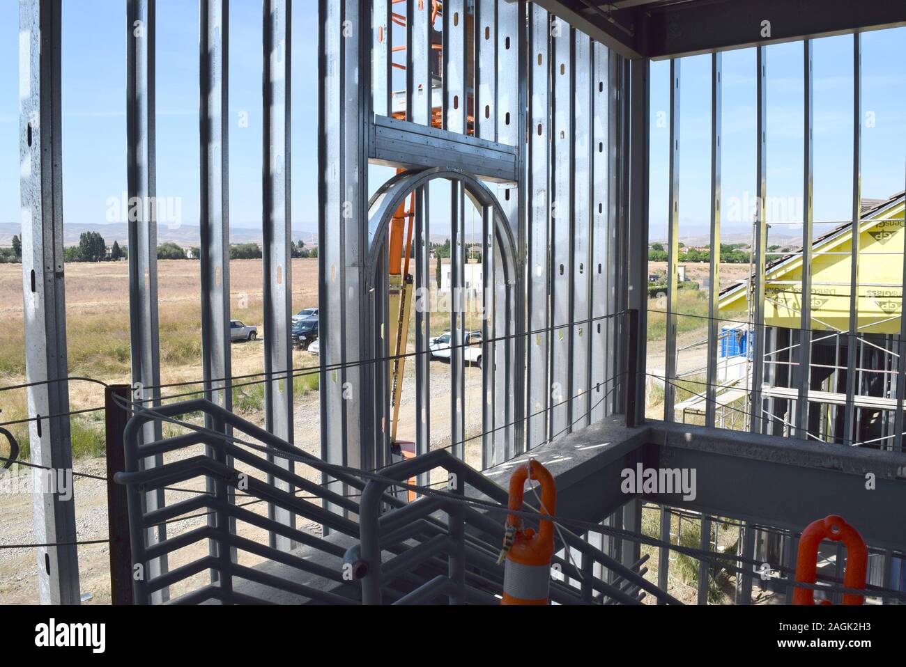 Metal-framed building under construction. Structure has mostly been ...