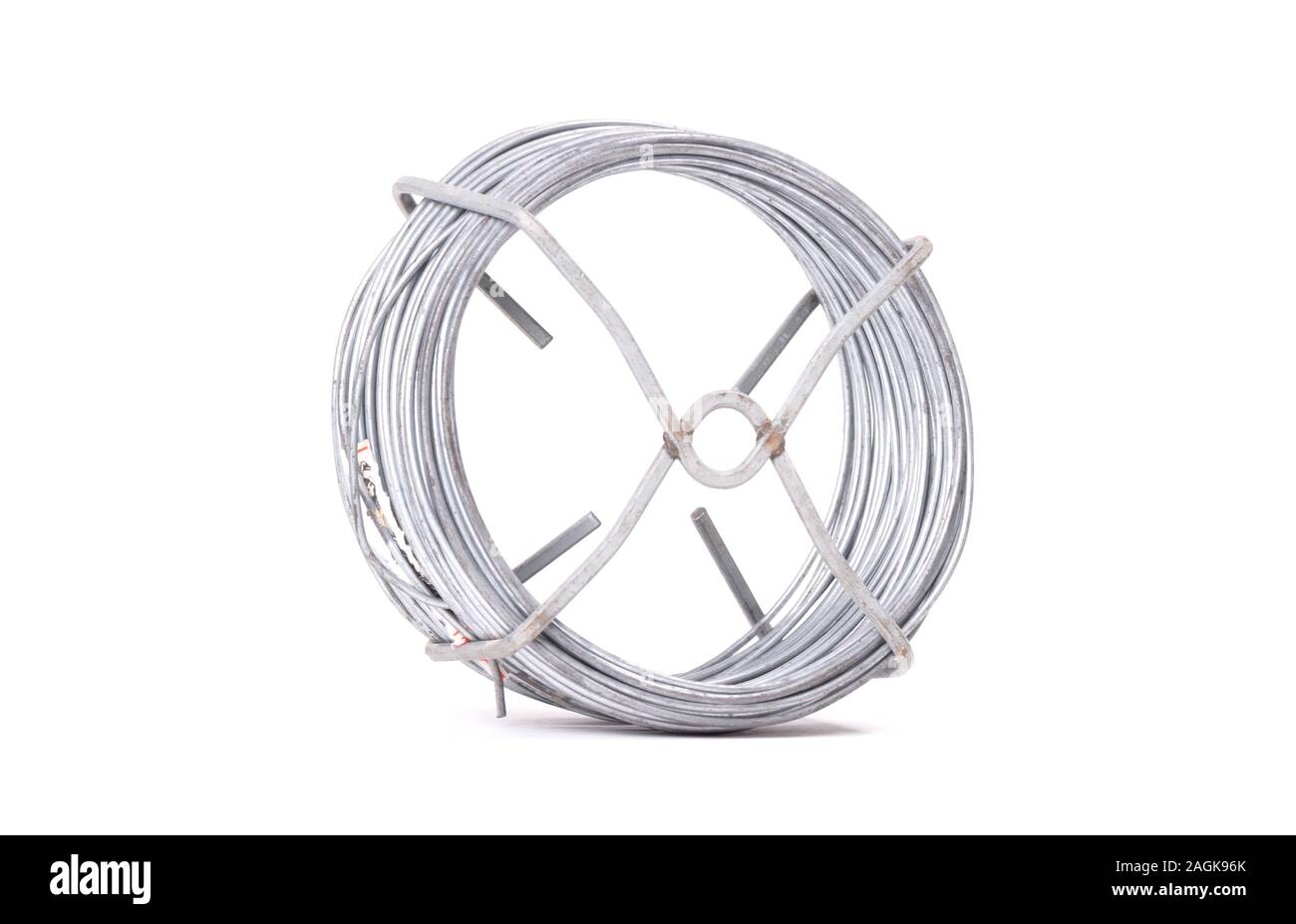 Roll of metal wire, vintage, isolated on white Stock Photo - Alamy