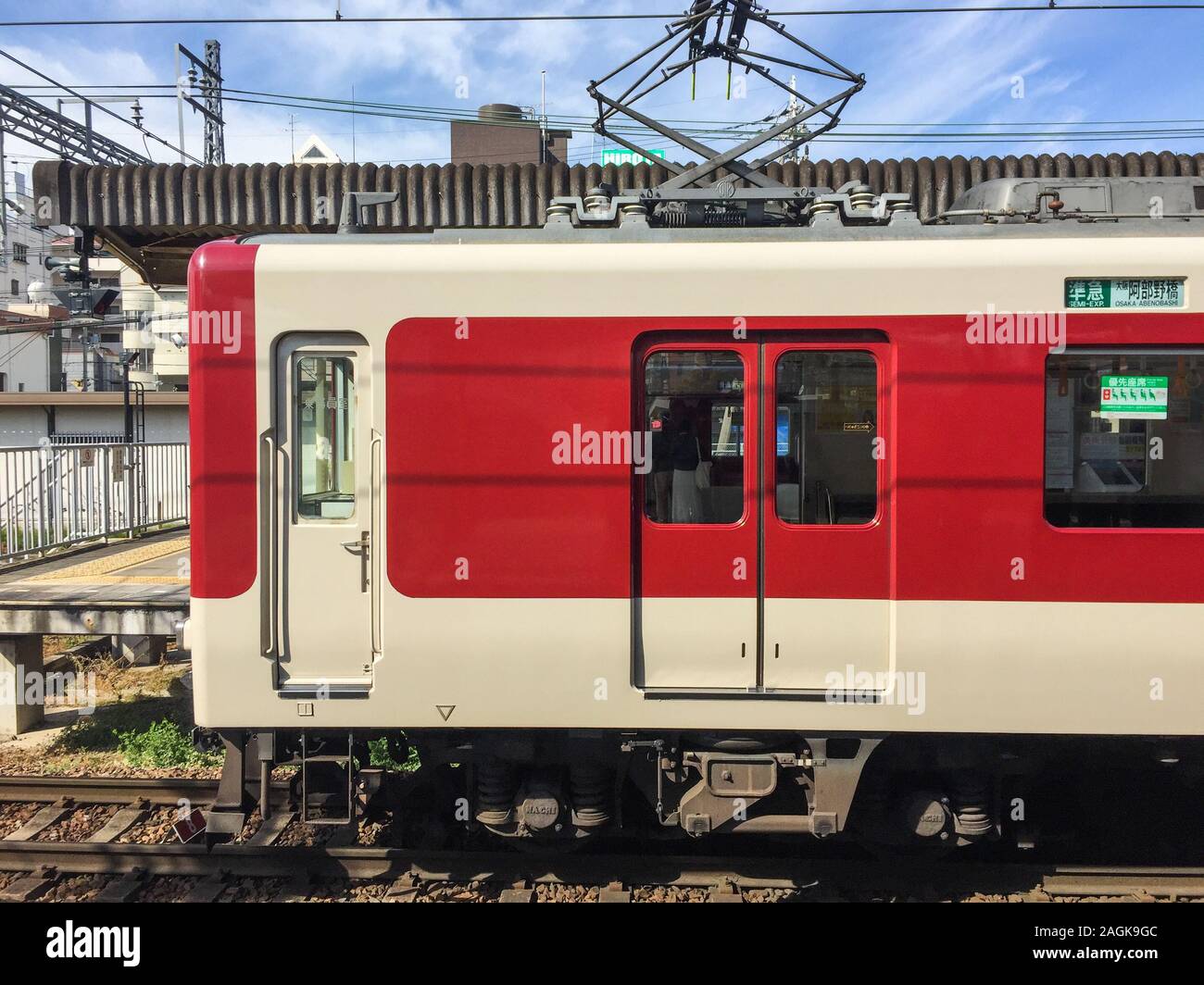 Osaka, Japan - Apr 12, 2019. A local train stopping at the JR station ...