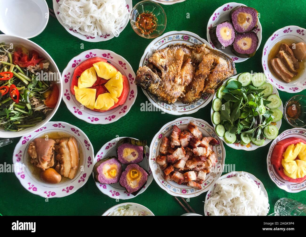 Traditional Vietnamese meal with rice, pork, fish and vegetable Stock ...
