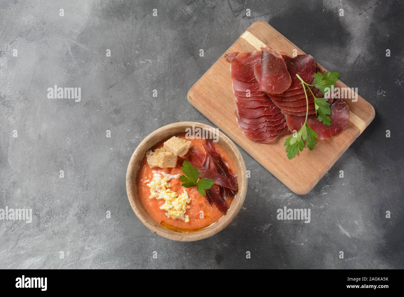 Traditional Spanish andalusian tomato cream soup Salmorejo served with ...