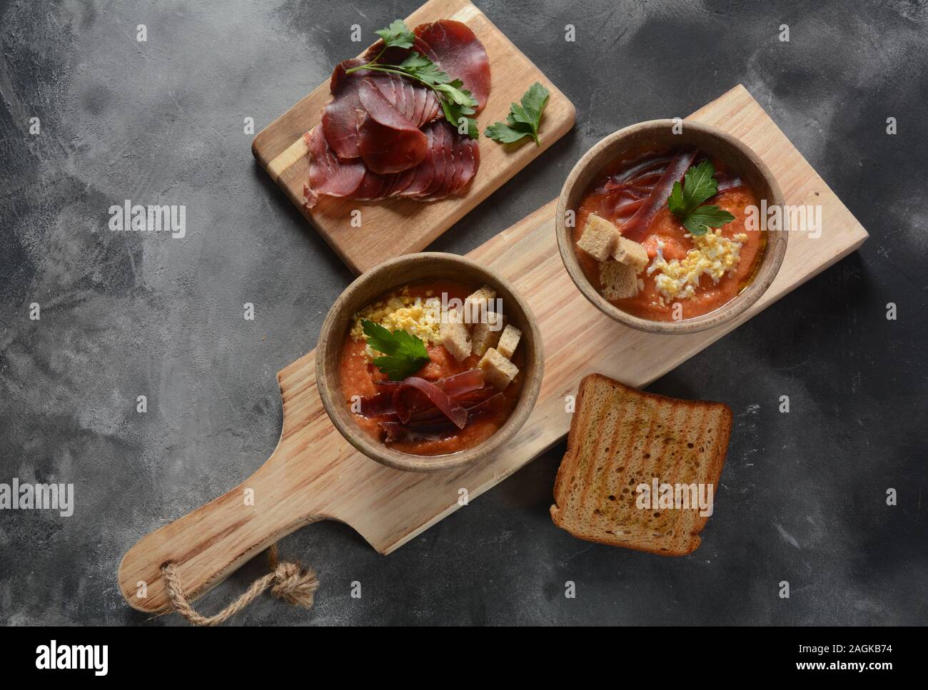 Traditional Spanish andalusian tomato cream soup Salmorejo served with ...