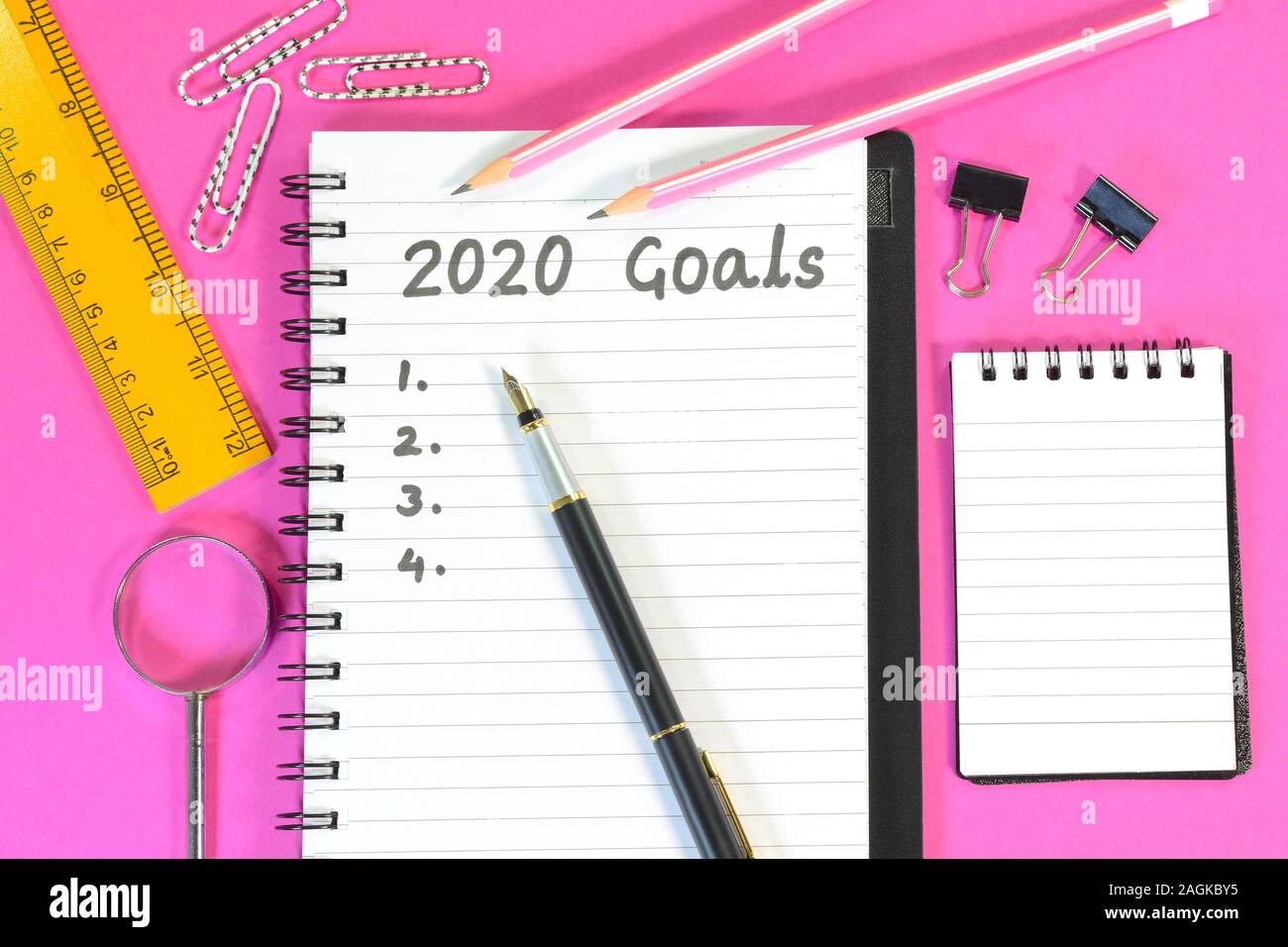 2020 goals written on a diary on a pink background Stock Photo - Alamy