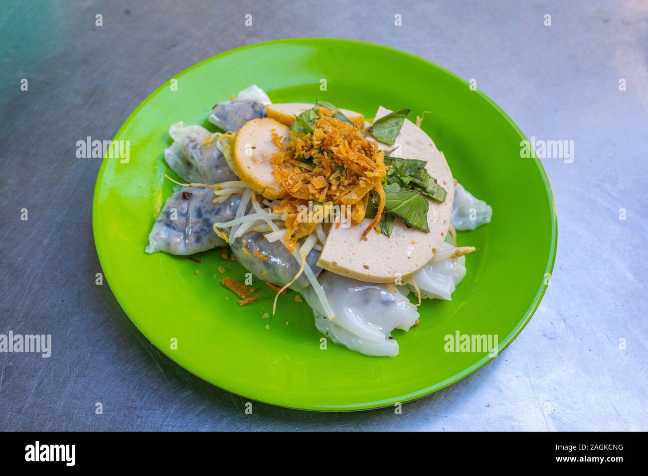 Plate of fresh cooked Vietnamese steamed rice rolls- Banh Cuon Stock ...