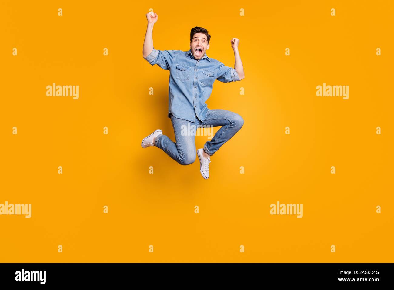 Full length body size photo of cheerful positive crazy man jumping up ...
