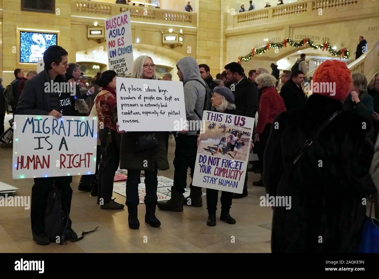 New York, NY / USA - December 19, 2019: Three activists from the group ...