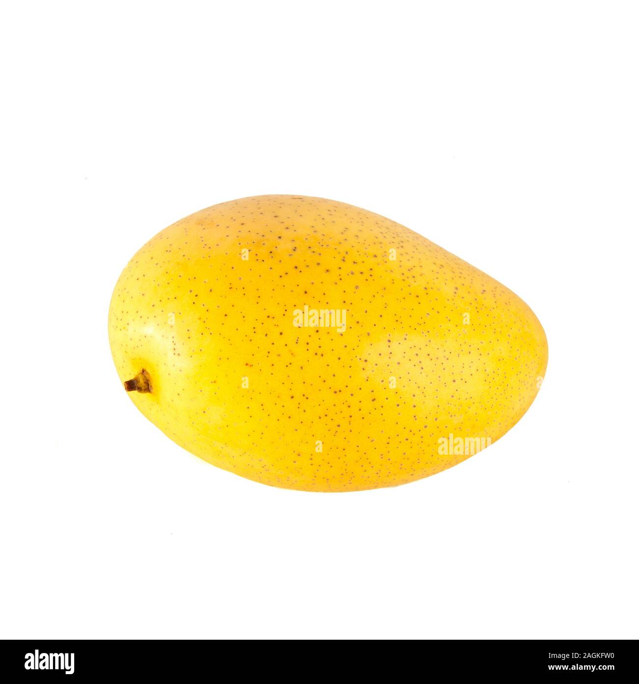 mangos or yellow mangos on a background new Stock Photo - Alamy