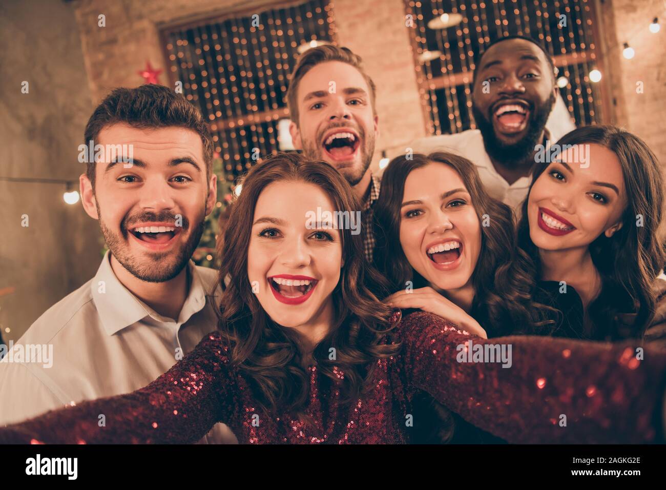 Close up photo of cheerful multiethnic group of fellows laugh scream ...