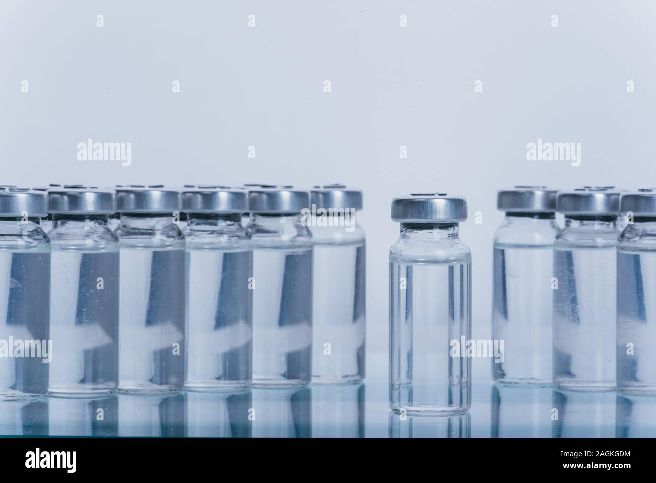 Glass medical ampoule vial for injection. Medicine is dry white drug ...