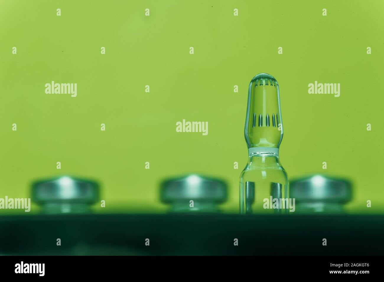 Glass medical ampoule vial for injection. Medicine is liquid sodium ...