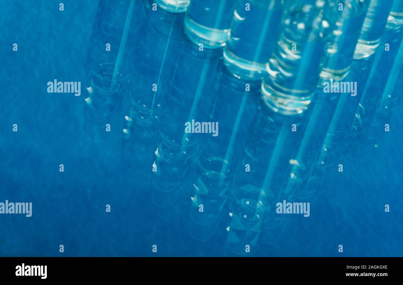 Glass medical ampoule vial for injection. Medicine is liquid sodium ...