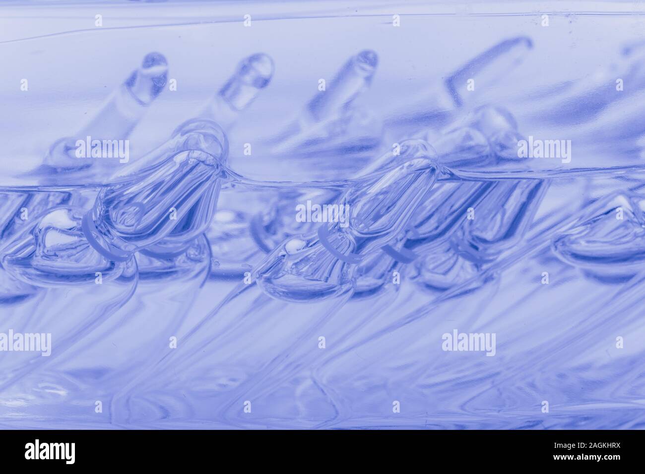 Glass medical ampoule vial for injection. Medicine is liquid sodium ...