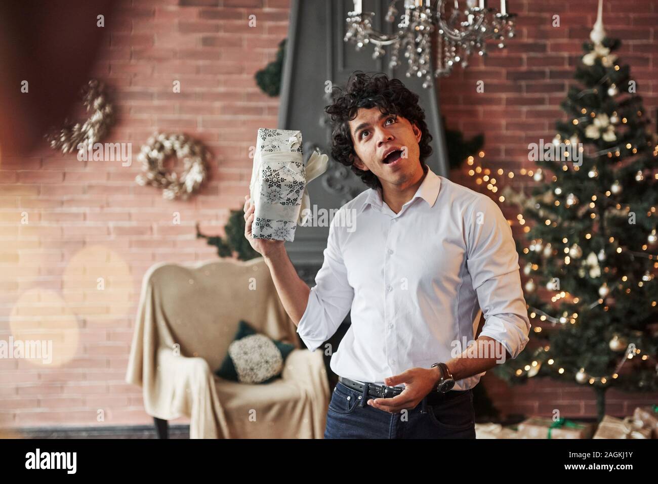 Shaking present hi-res stock photography and images - Alamy