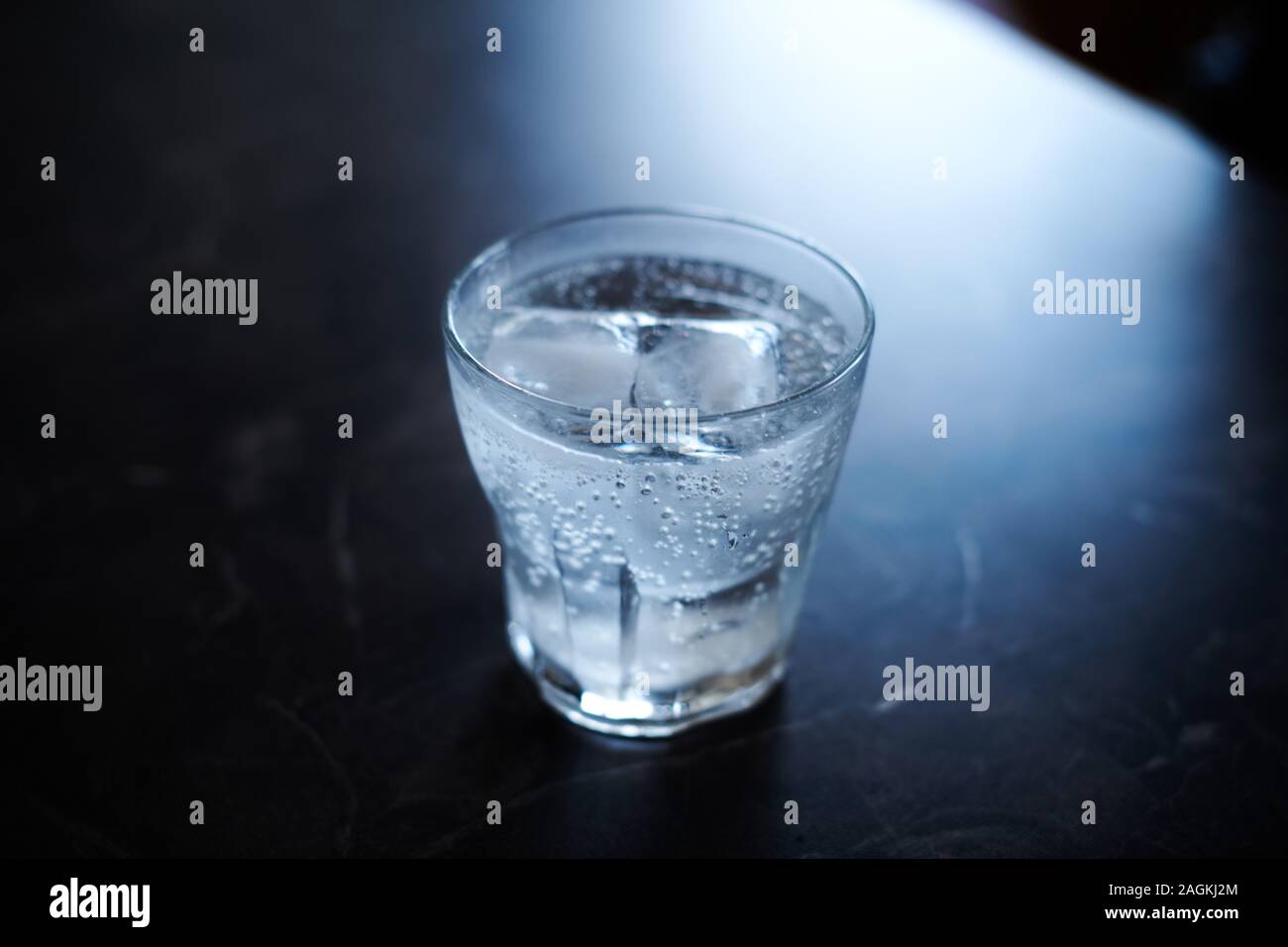 Gin Tonic Cocktail served with ice, on a black marble surface Stock ...