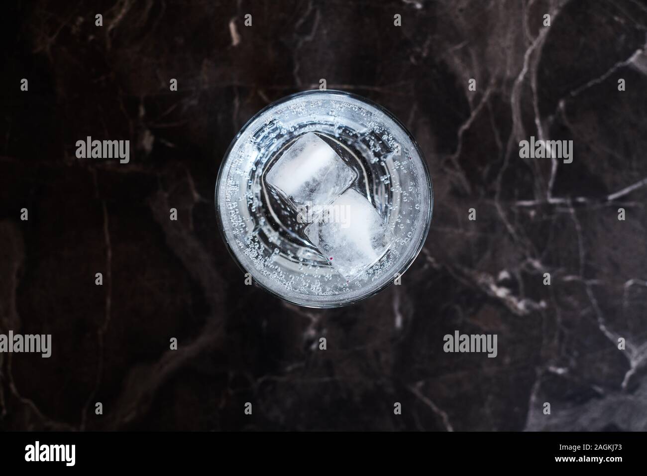 Gin Tonic Cocktail served with ice, on a black marble surface Stock ...