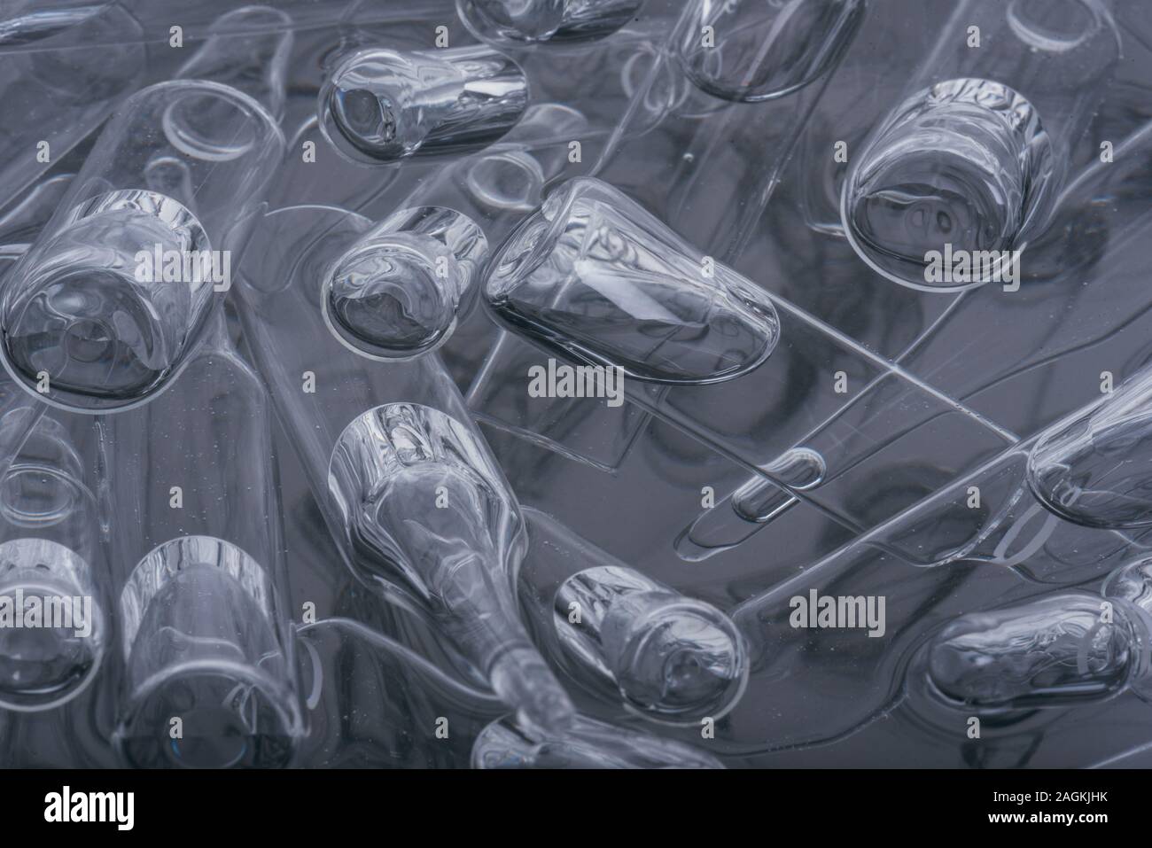 Glass medical ampoule vial for injection. Medicine is liquid sodium ...