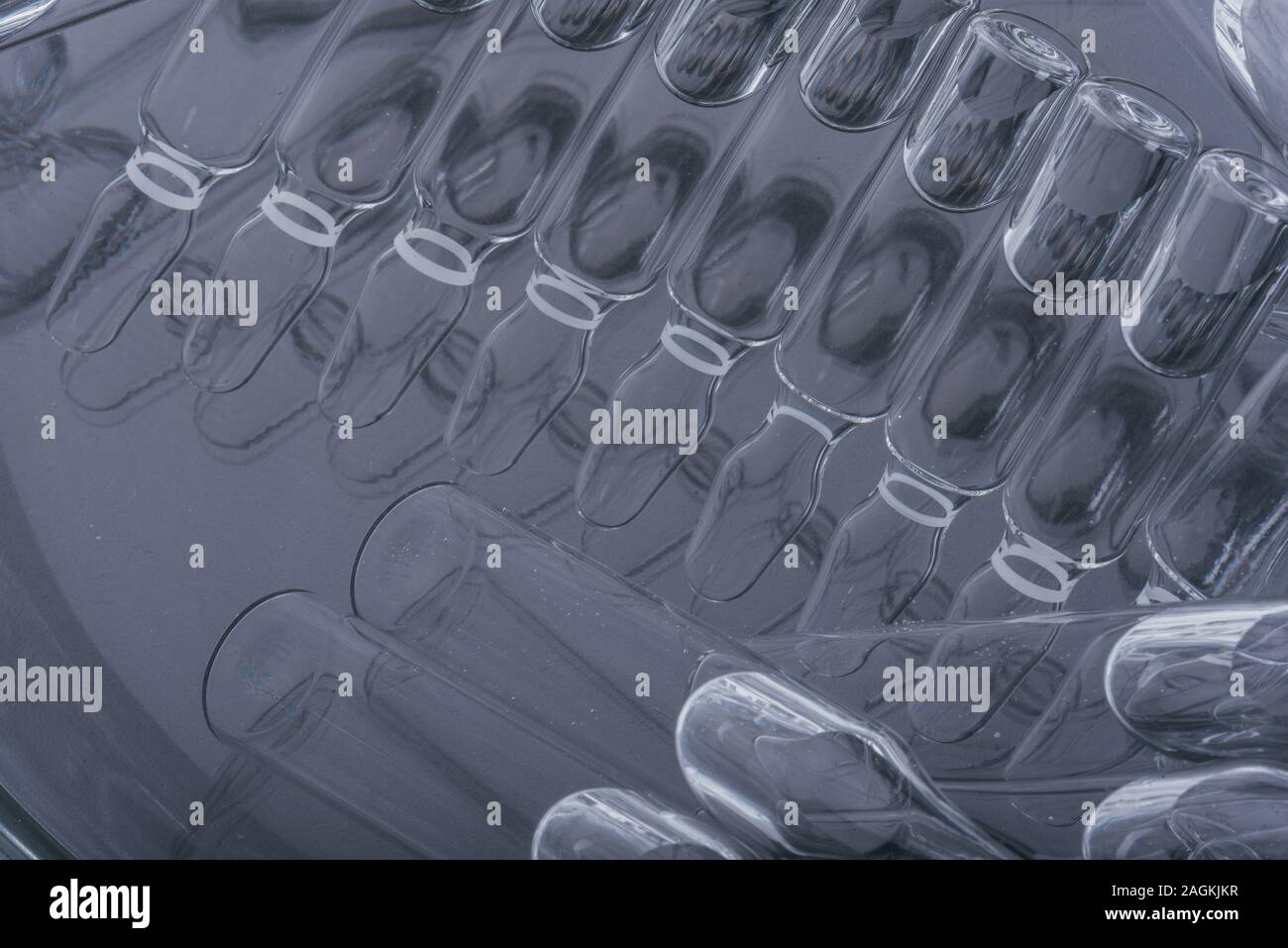 Glass medical ampoule vial for injection. Medicine is liquid sodium ...