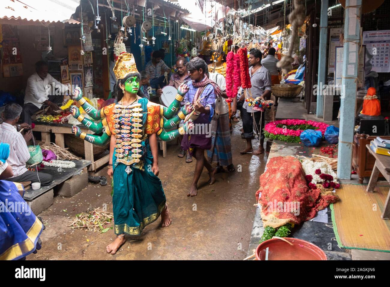 Group dressed as Hindu deities walking through Goubert Market during ...