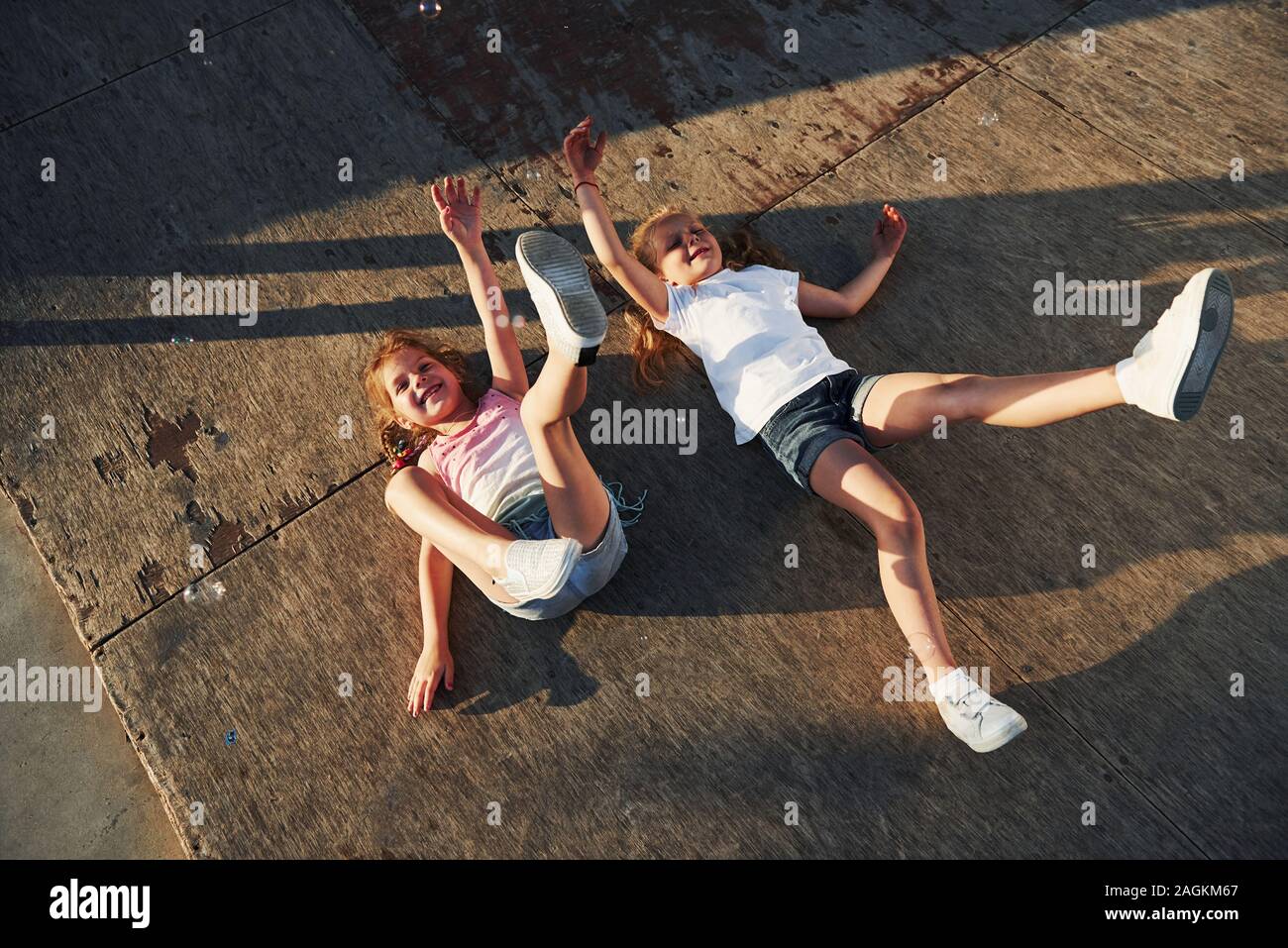 Having fun and lying down wooden ramp. Summertime happiness Stock Photo ...