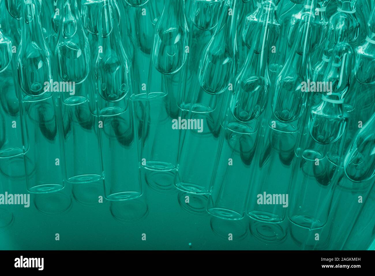 Glass medical ampoule vial for injection. Medicine is liquid sodium ...