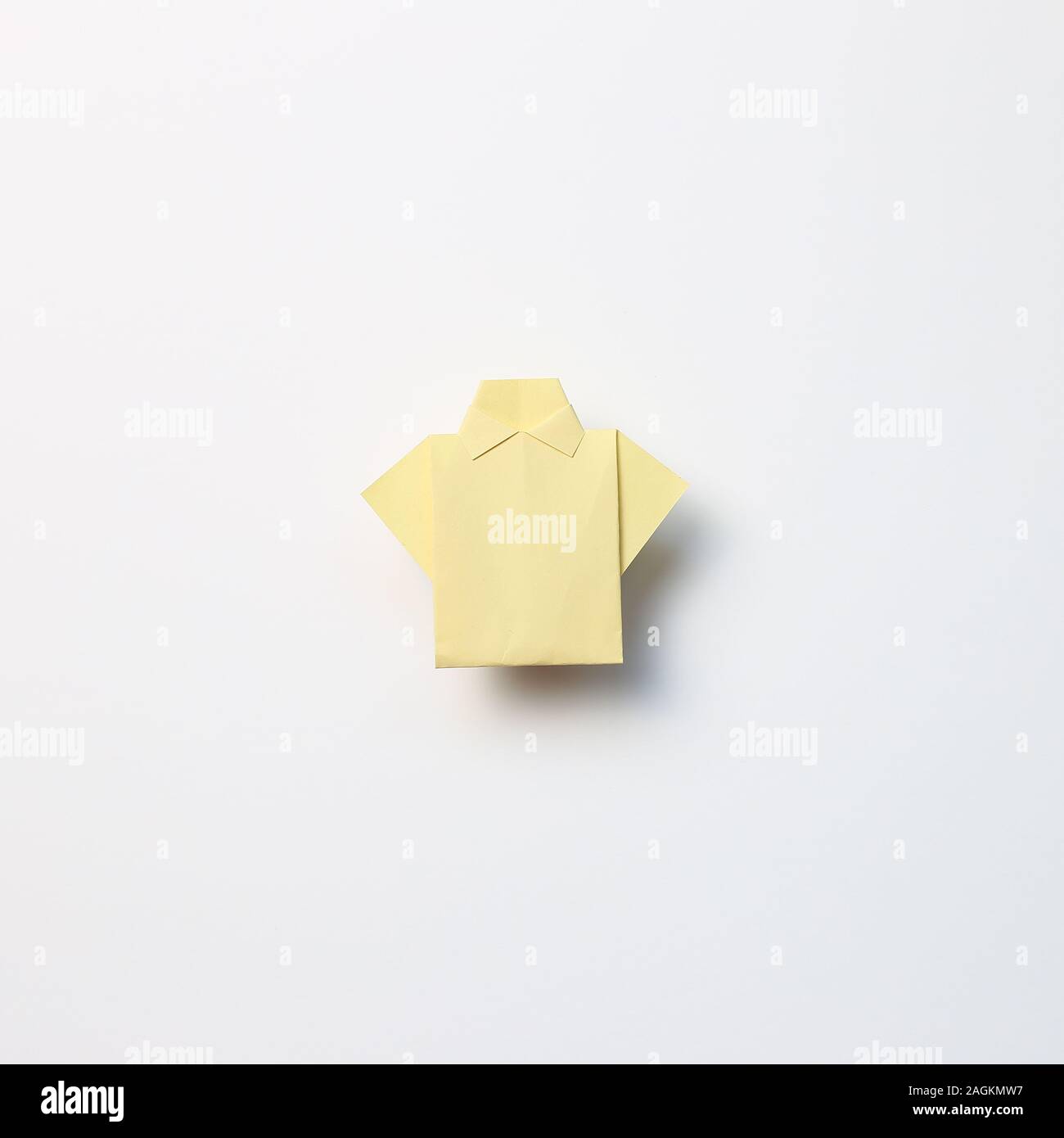 White origami paper shirt hi-res stock photography and images - Alamy