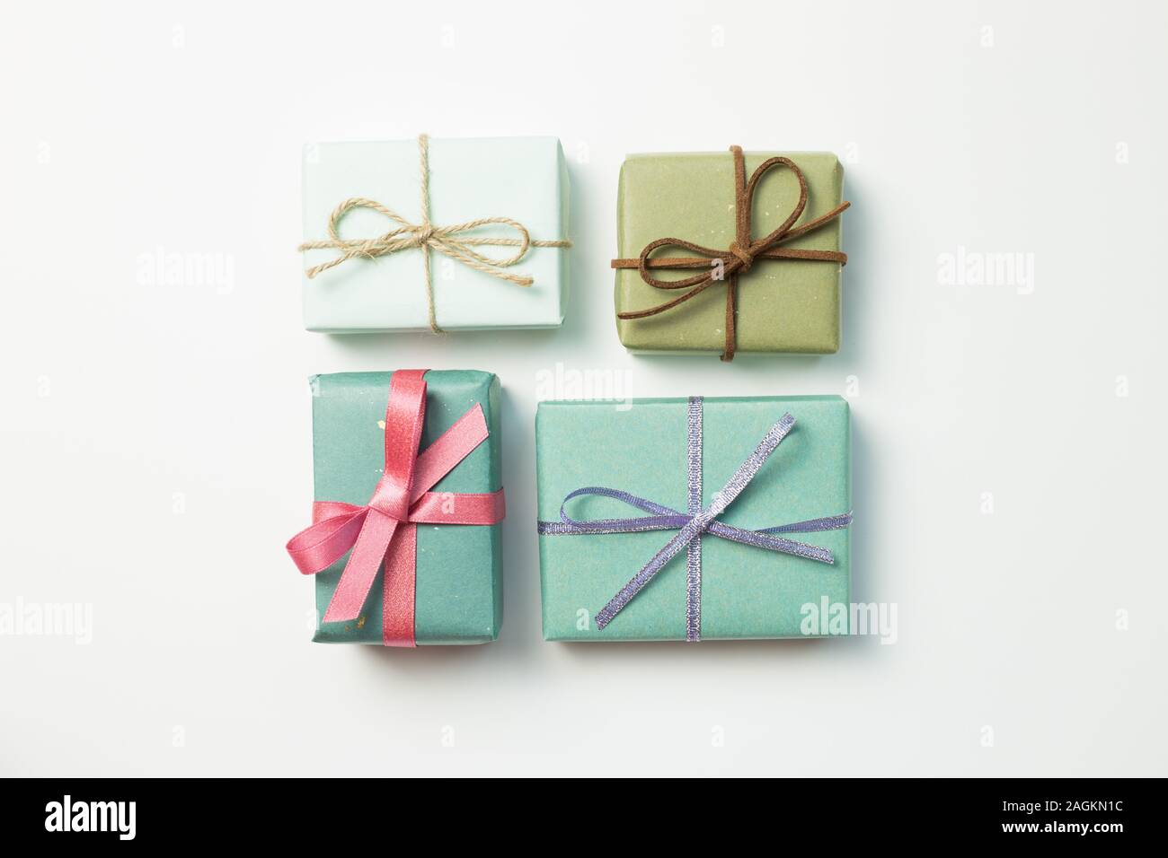 Green gift boxes on white background. Christmas or birthday ...