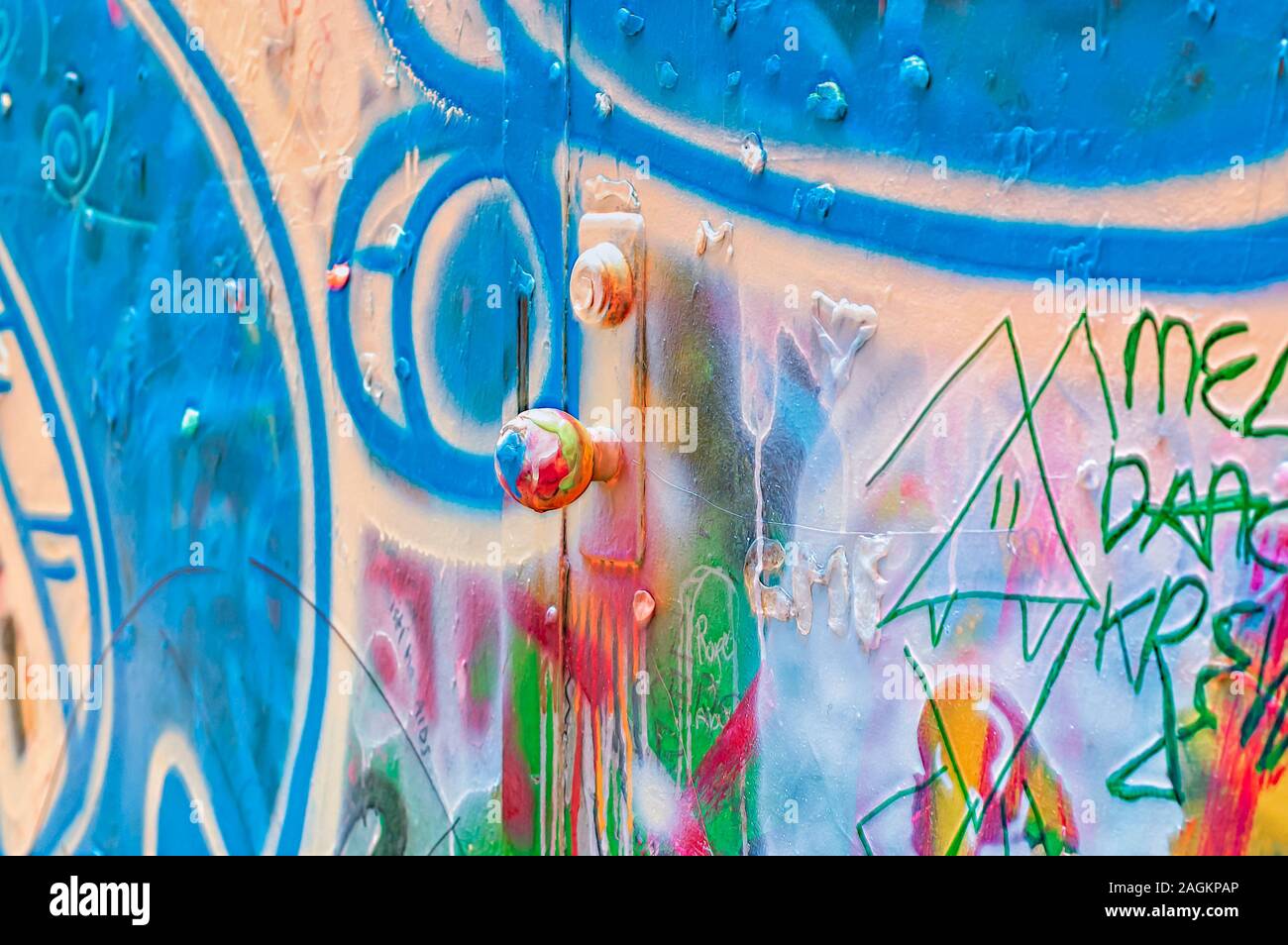 Graffiti adorned door at tripper's alley or poet's alley or graffiti ...