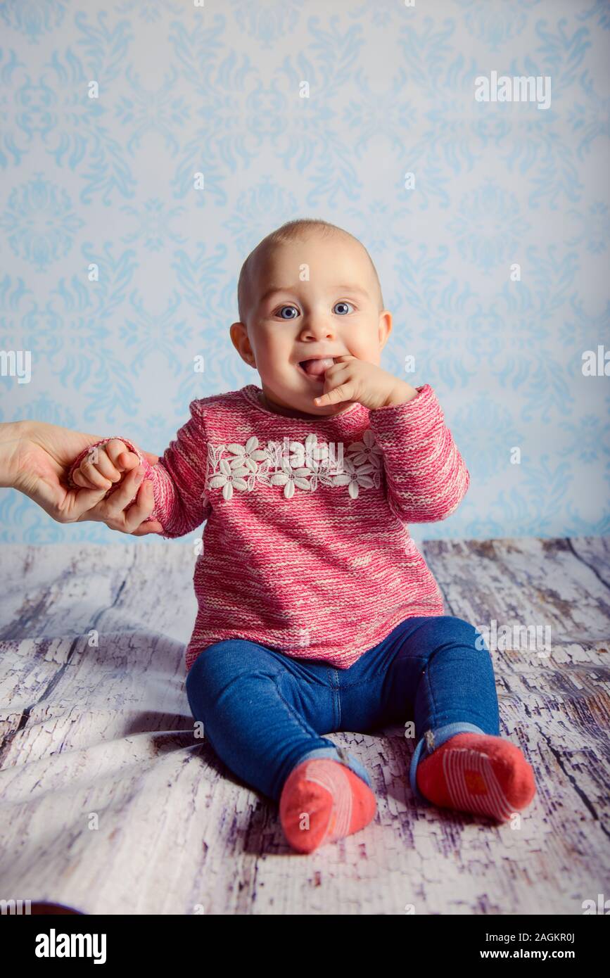 Portrait of adorable baby girl. Childhood. Authentic image Stock Photo ...