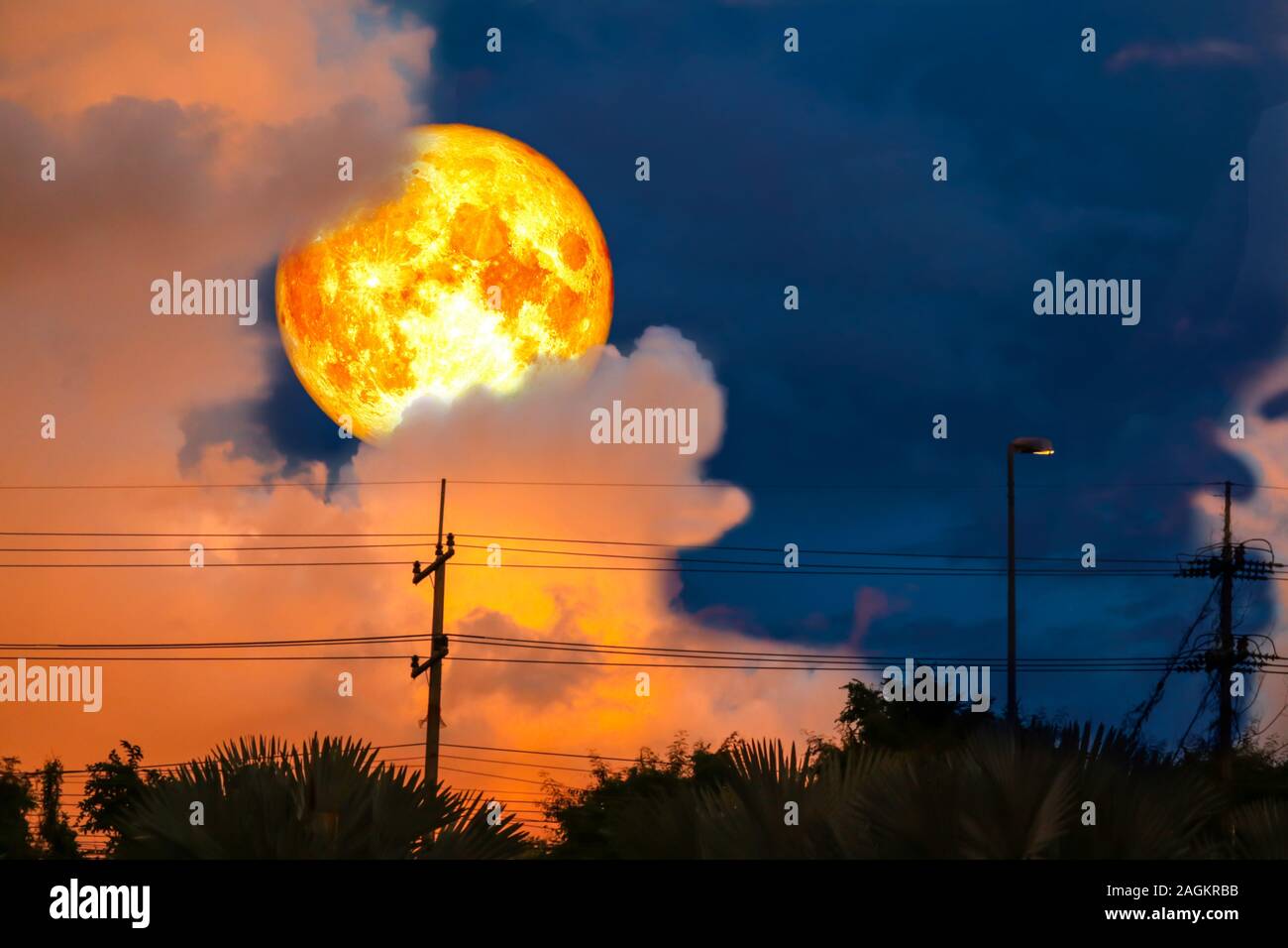Full fish Moon back on silhouette power electric line and pole on night ...