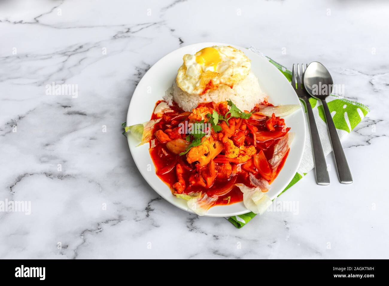 Ayam masak merah is a Malaysia traditional dish. This literally means ...