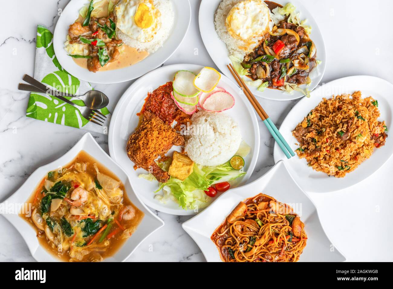 Variety of delicious Asia Muslim Malay daily home cooked food on table ...