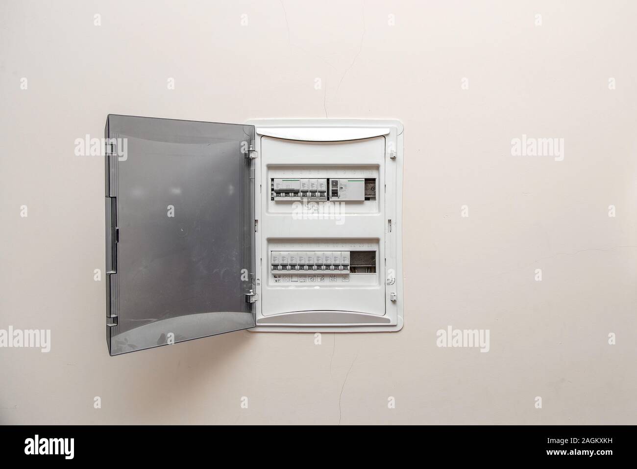 Electricity distribution box. Fusebox. Isolated on apartment wall Stock ...