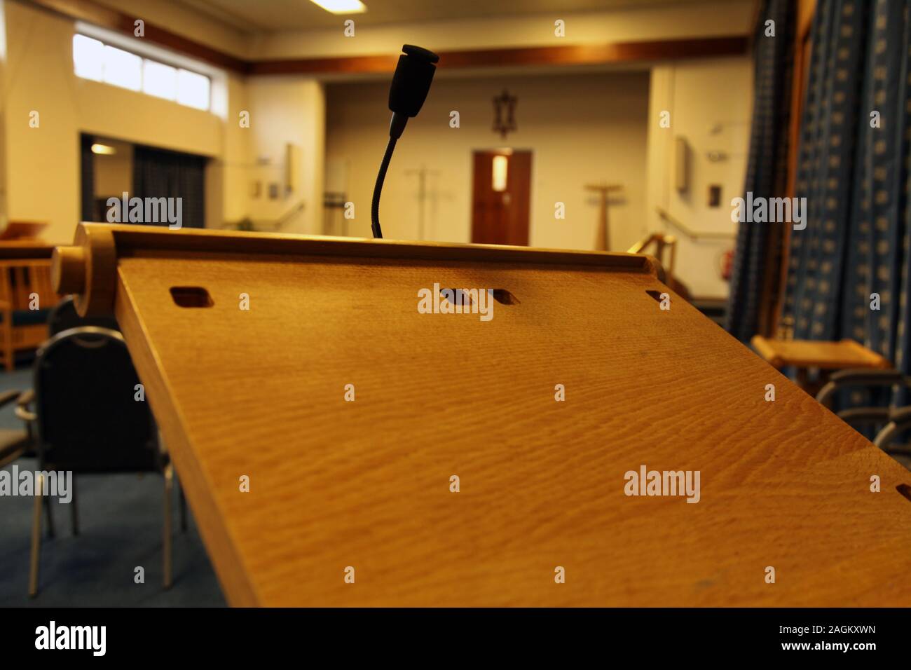 An empty lectern inside a modern synagogue Stock Photo - Alamy
