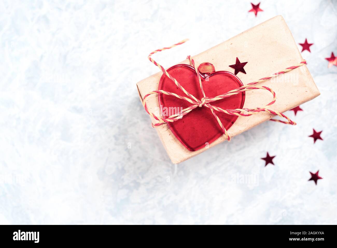Valentine's Day Gift box with a red bow and heart Stock Photo - Alamy