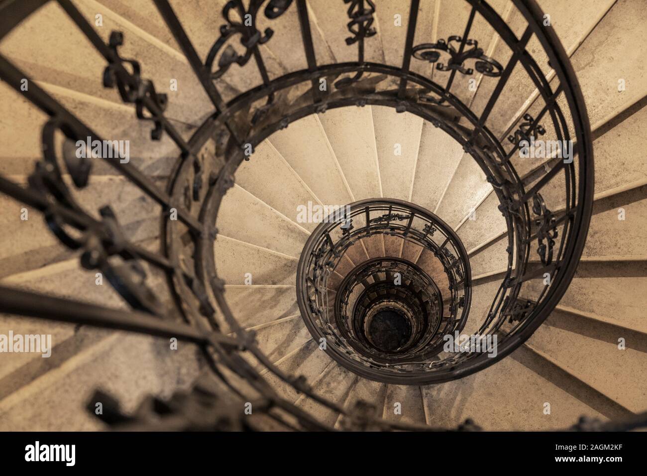 Spiral stairs with metal fence in St. Stephens Basilica in Budapest ...