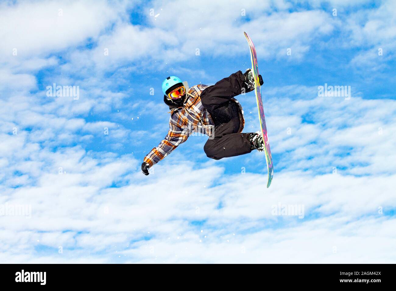 jump with snowboard in fresh snow Stock Photo - Alamy