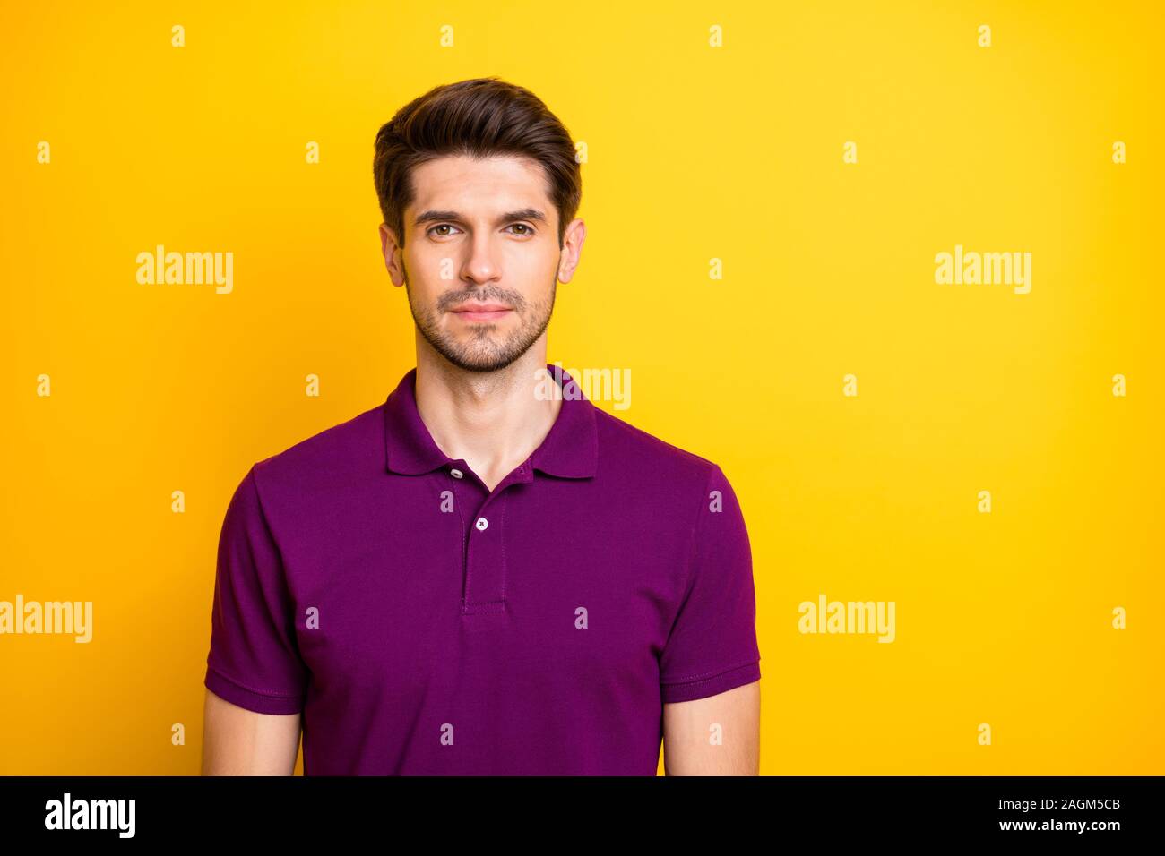 Photo of confident serious man staring at you candidly in wait of your ...