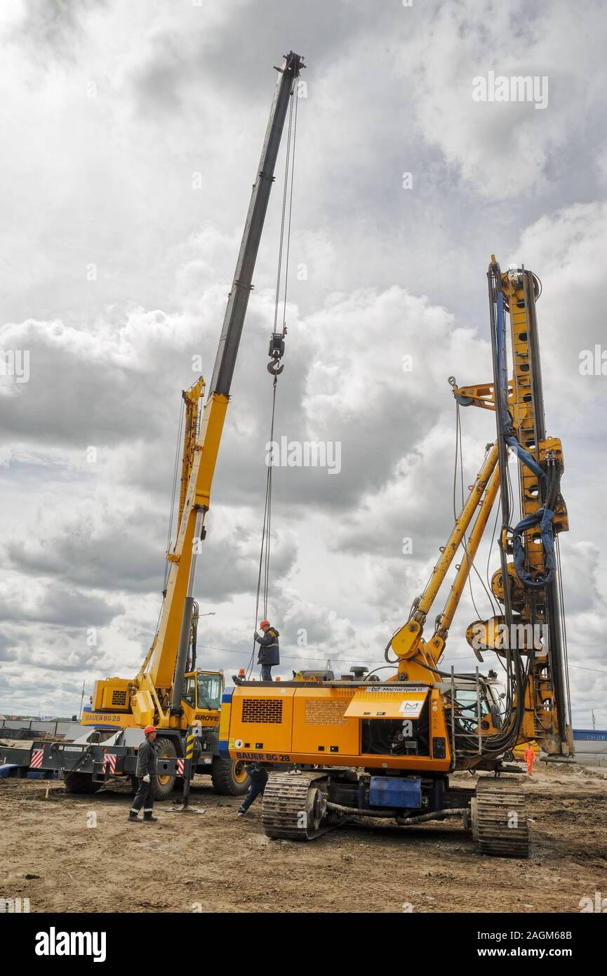 Construction equipment in action. Tyumen Stock Photo - Alamy