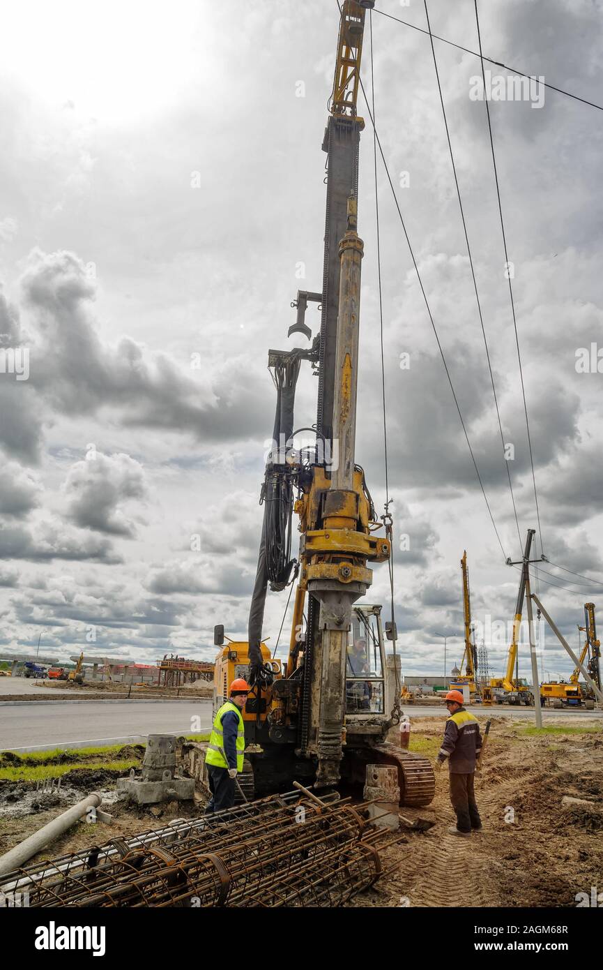 Pile driving machine in construction site. Tyumen Stock Photo - Alamy