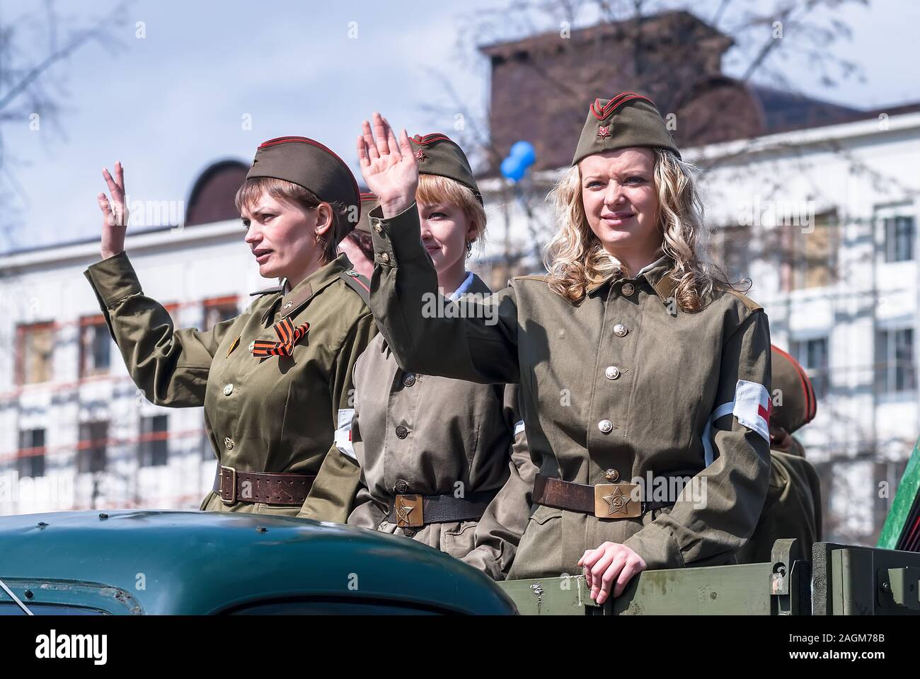 Attractive girls in uniform of times WW2 on parade Stock Photo - Alamy